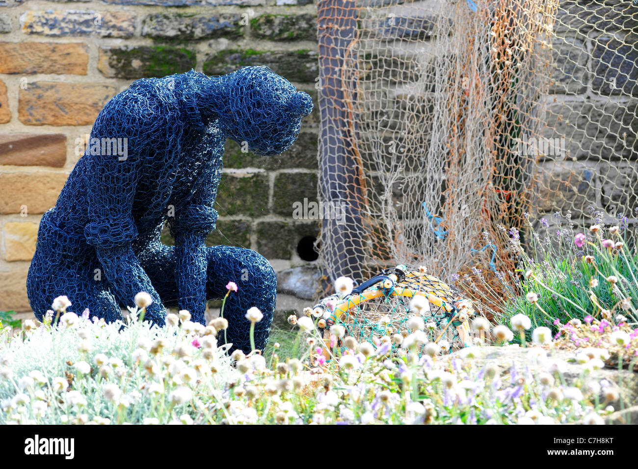 Sculpture fisherman with net hi-res stock photography and images - Alamy