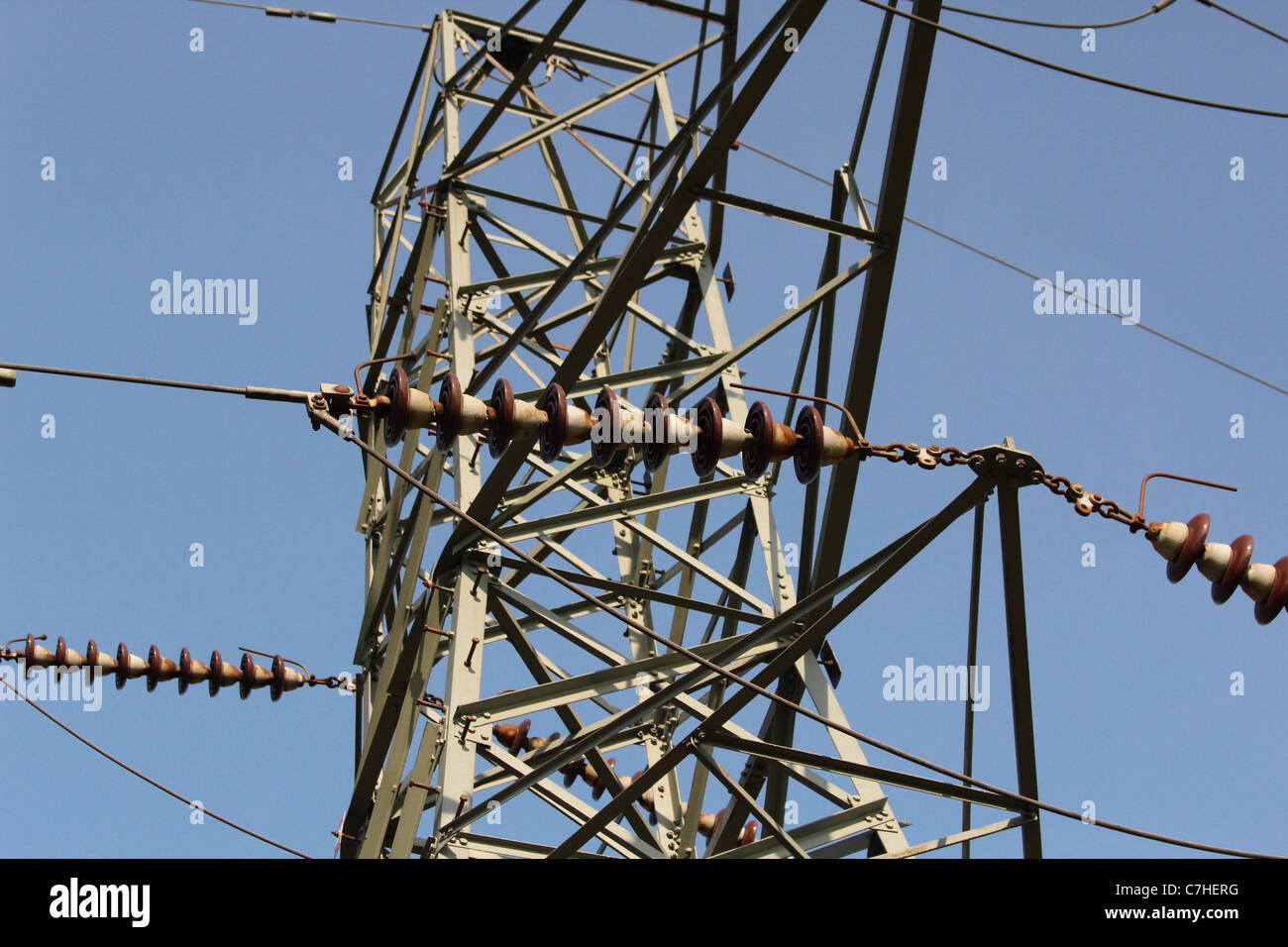 Close up of the top of an electricity pylon Stock Photo - Alamy