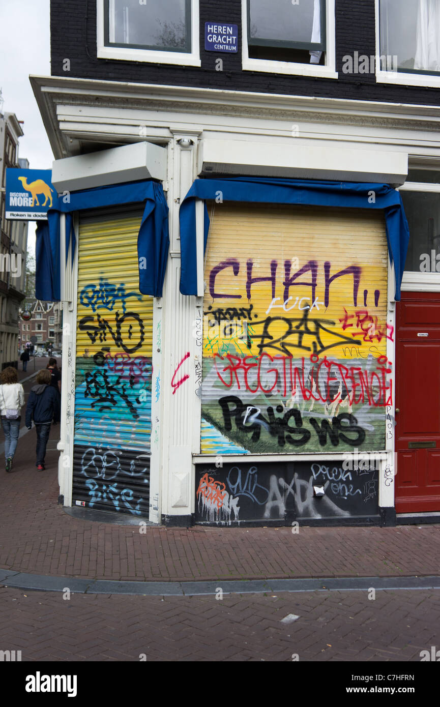 Graffiti on corner shop in Amsterdam, Holland Stock Photo - Alamy