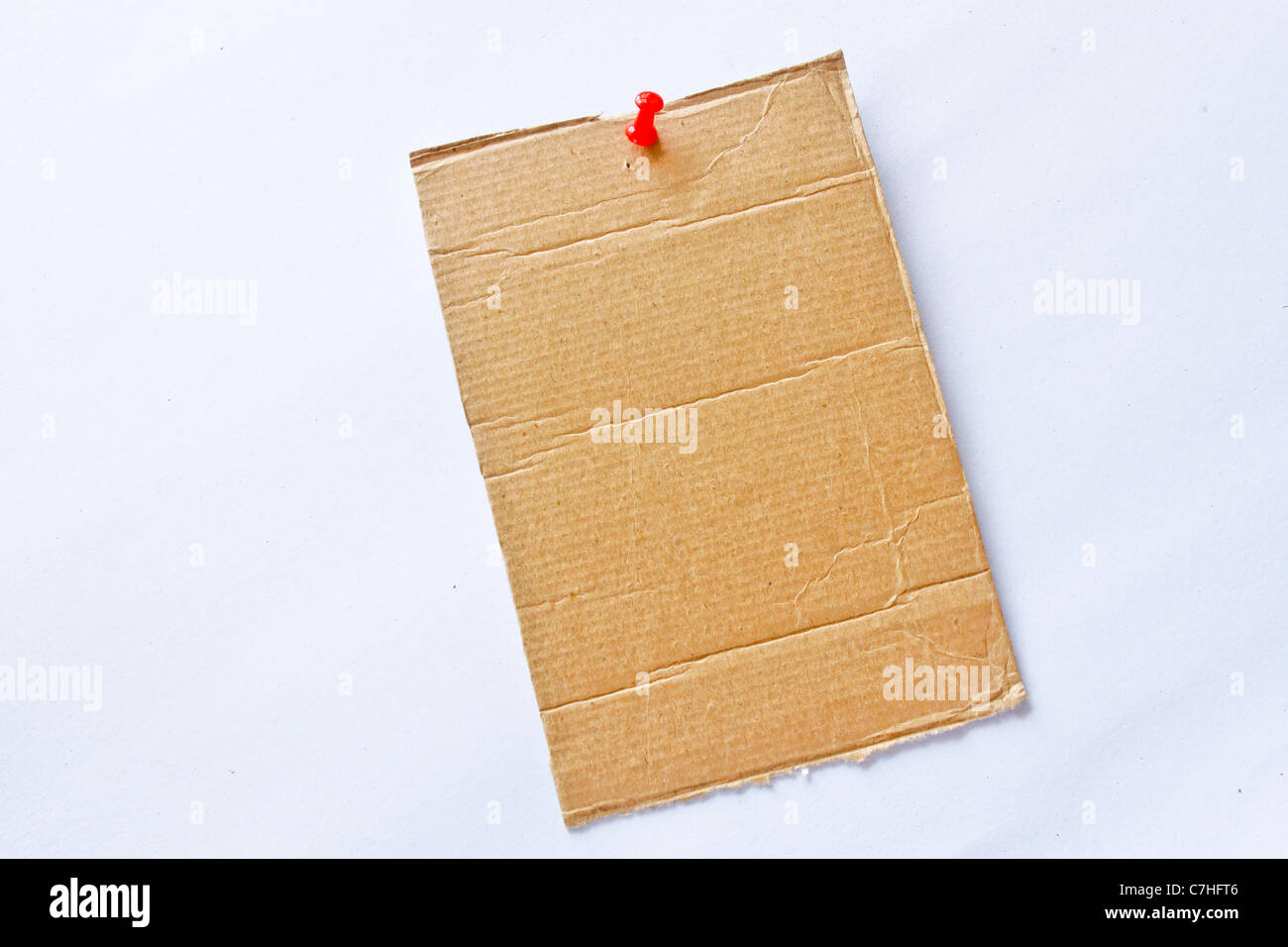 note papers cardboard with red push pins on white background Stock ...