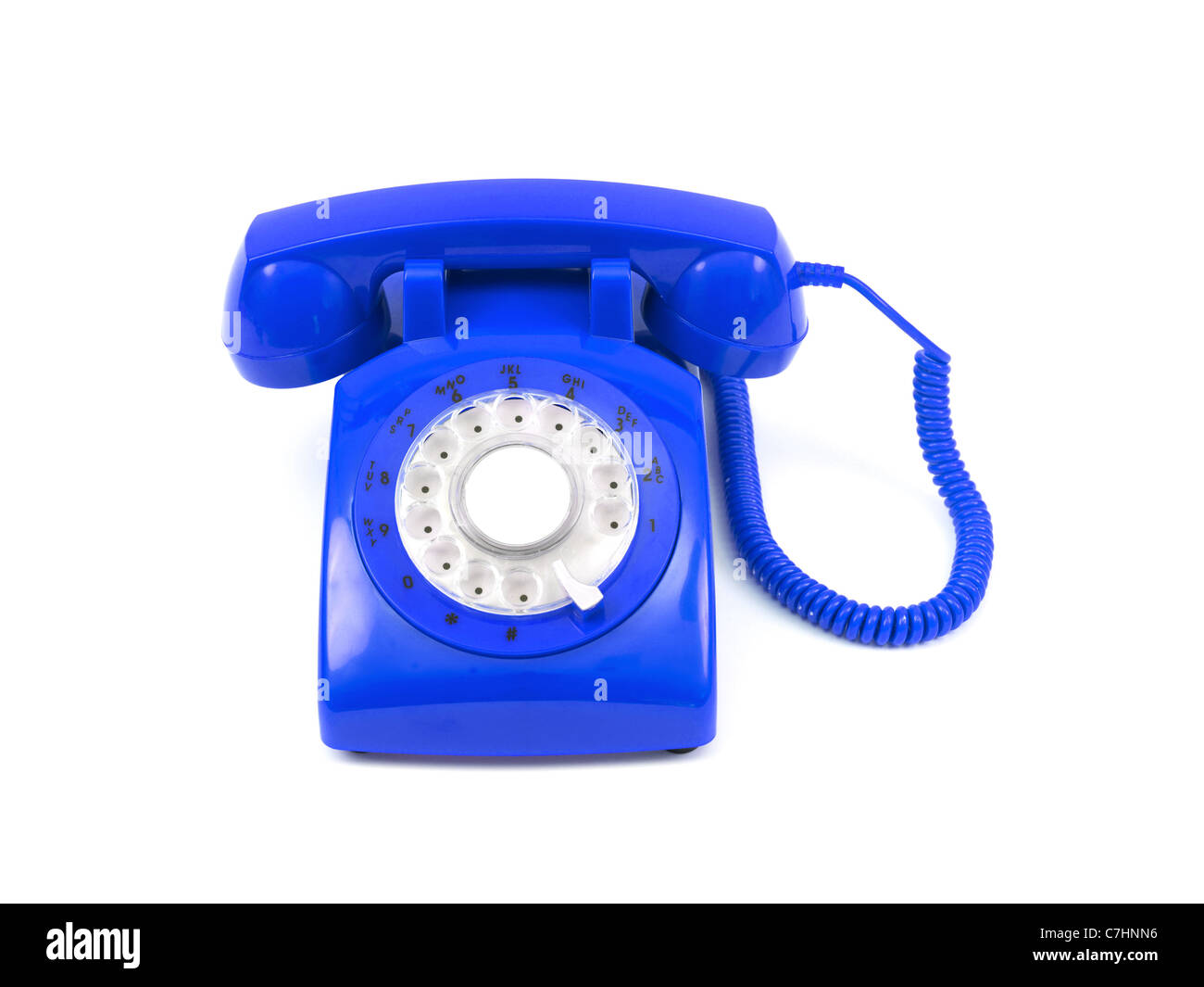 A rotary telephone isolated against a white background Stock Photo - Alamy