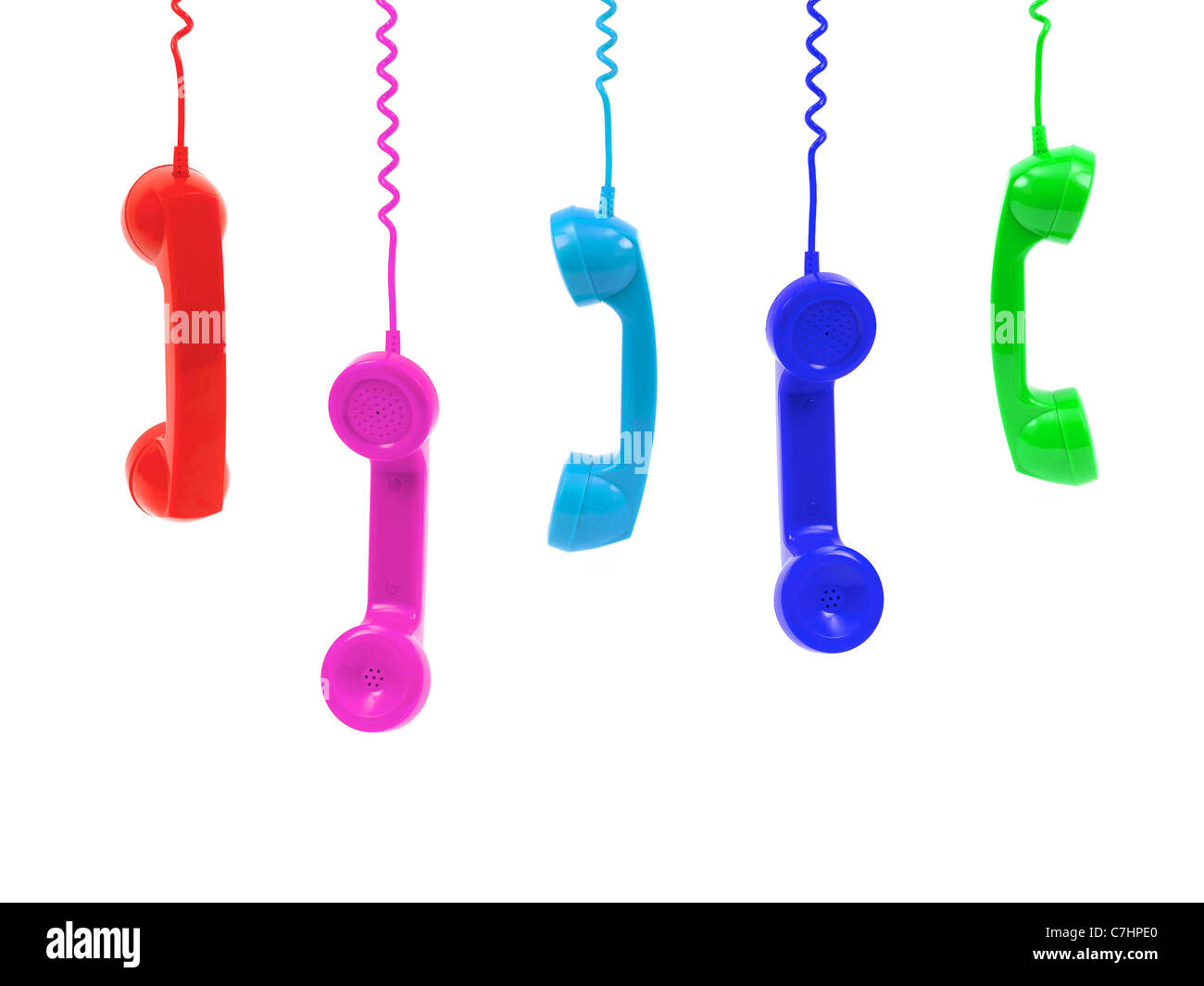 Colored telephone handsets isolated against a white background Stock ...