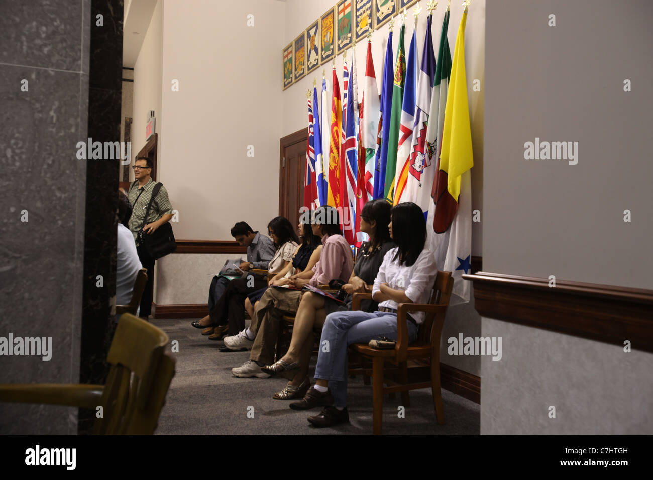 New Canadian citizens attend a citizenship ceremony in Kitchener ...