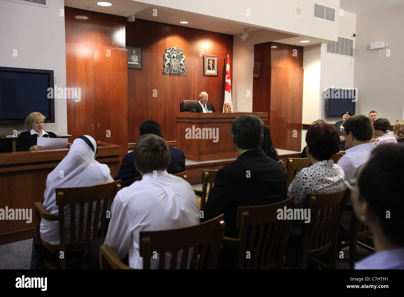 New Canadian citizens attend a citizenship ceremony in Kitchener ...