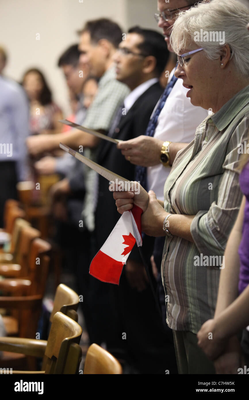 New Canadian citizens attend a citizenship ceremony in Kitchener ...