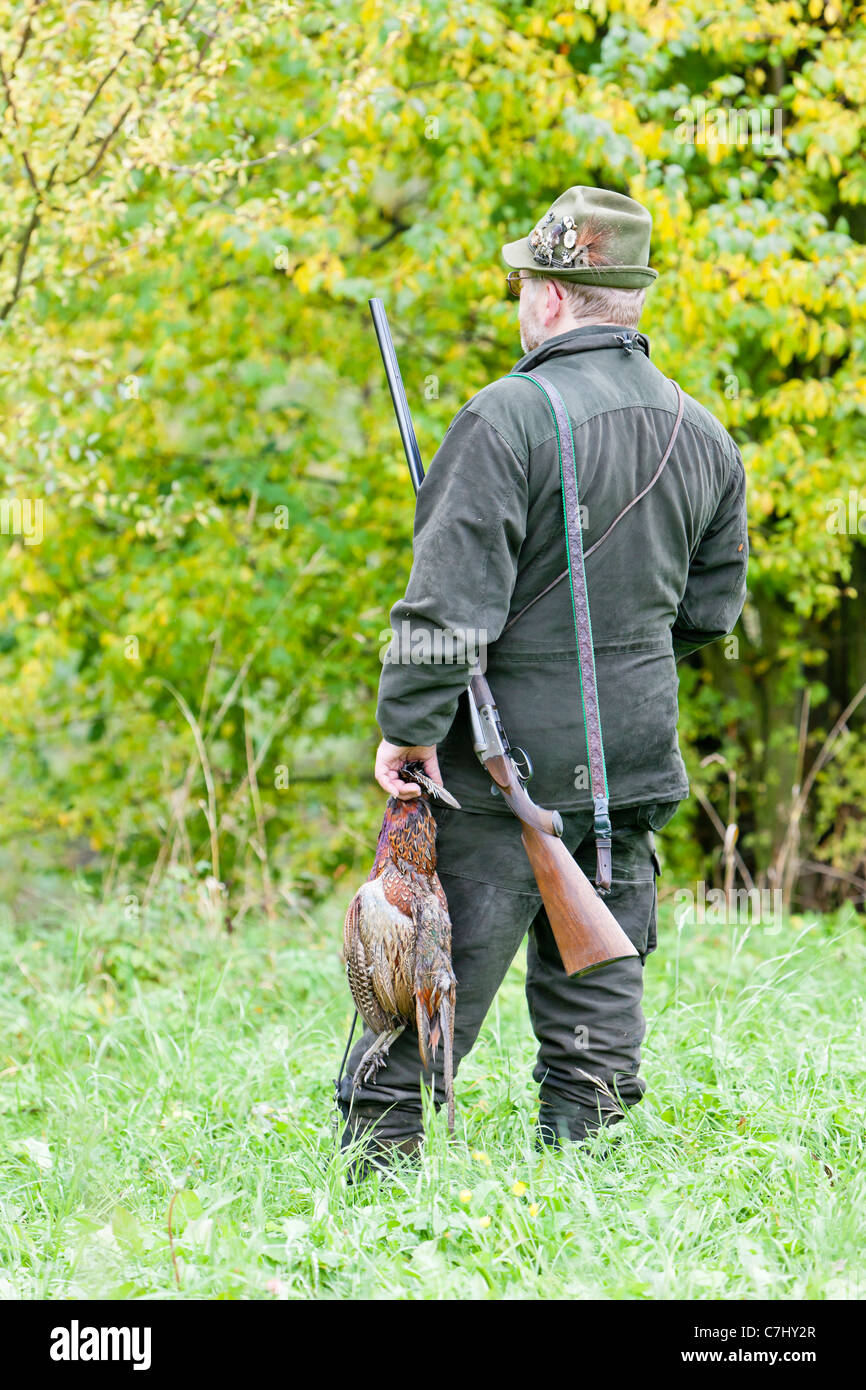 hunter with a catch Stock Photo - Alamy