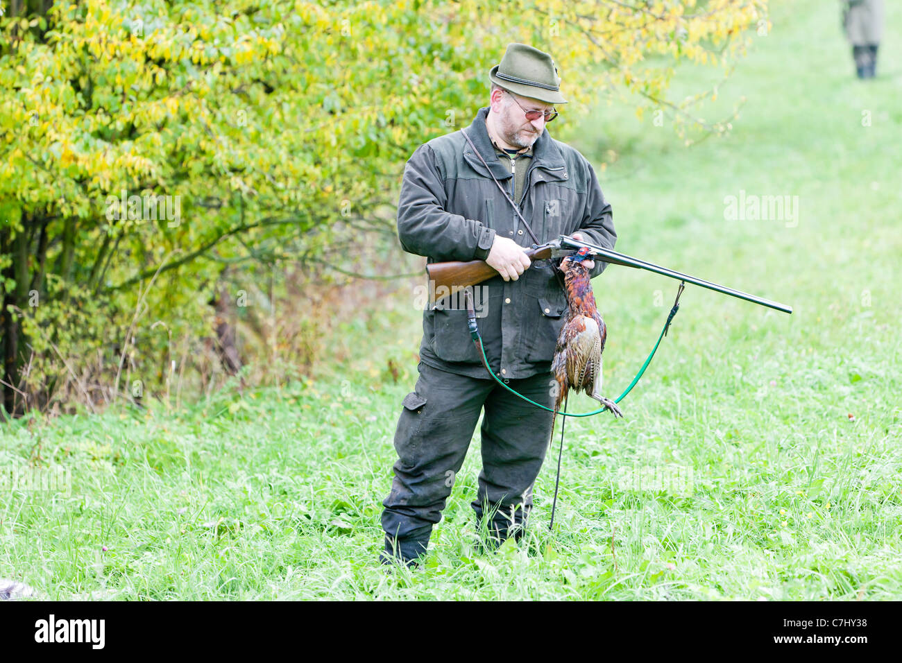 hunter with a catch Stock Photo - Alamy
