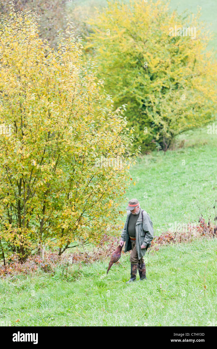 hunter with a catch Stock Photo - Alamy
