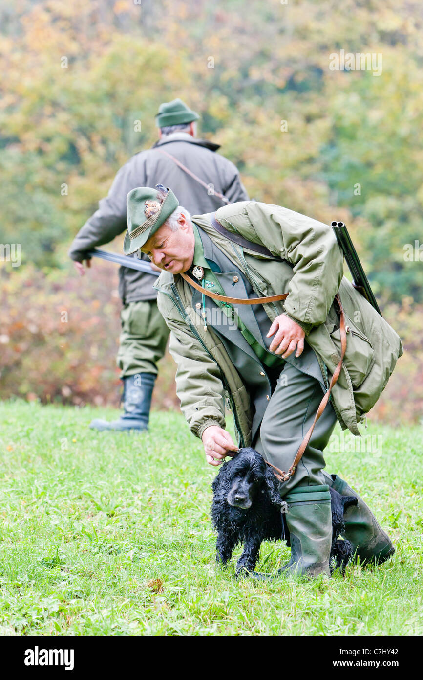 hunter with his dog hunting Stock Photo - Alamy