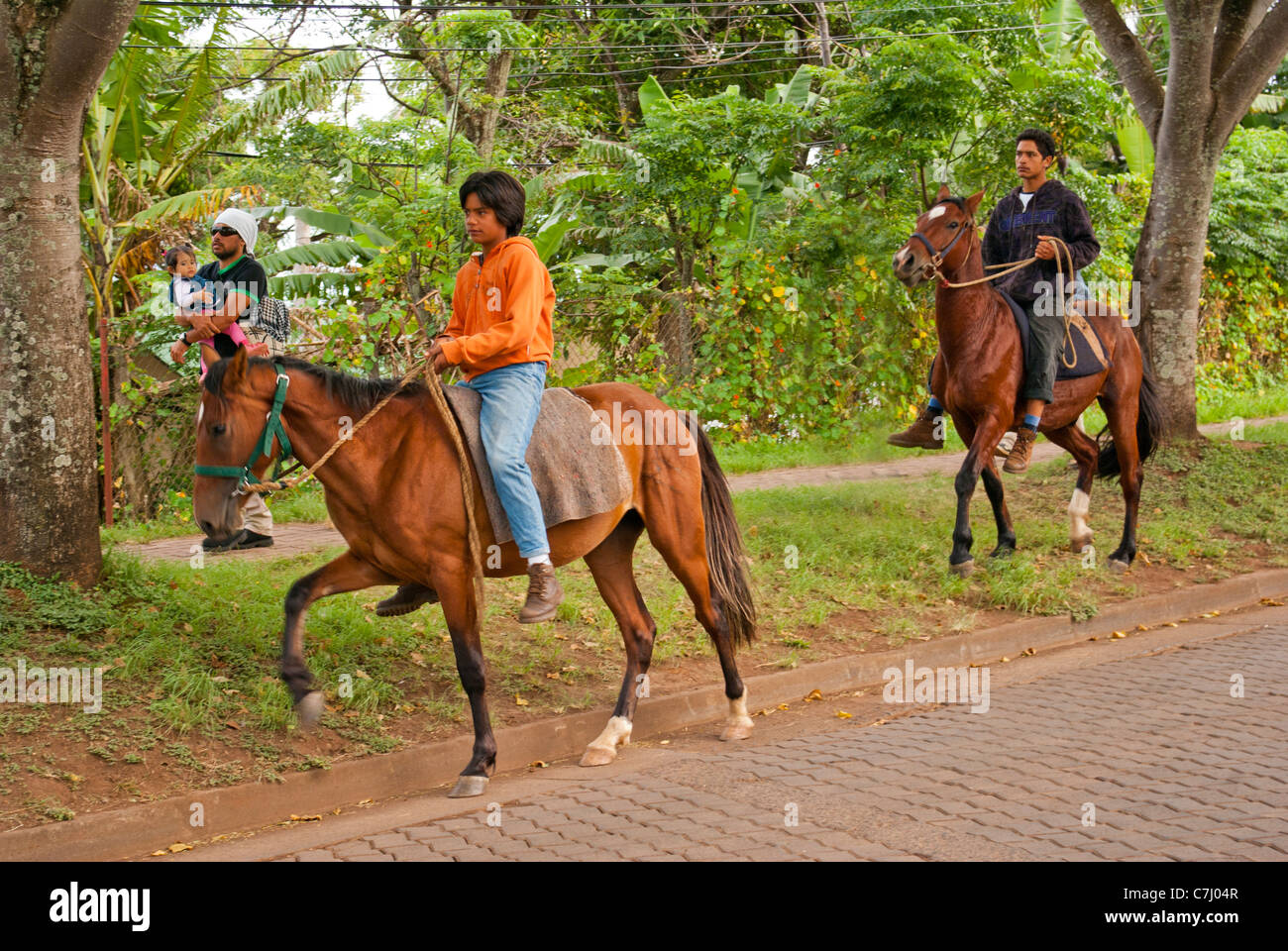 Rapa nui two young men ride horseba hi-res stock photography and images ...