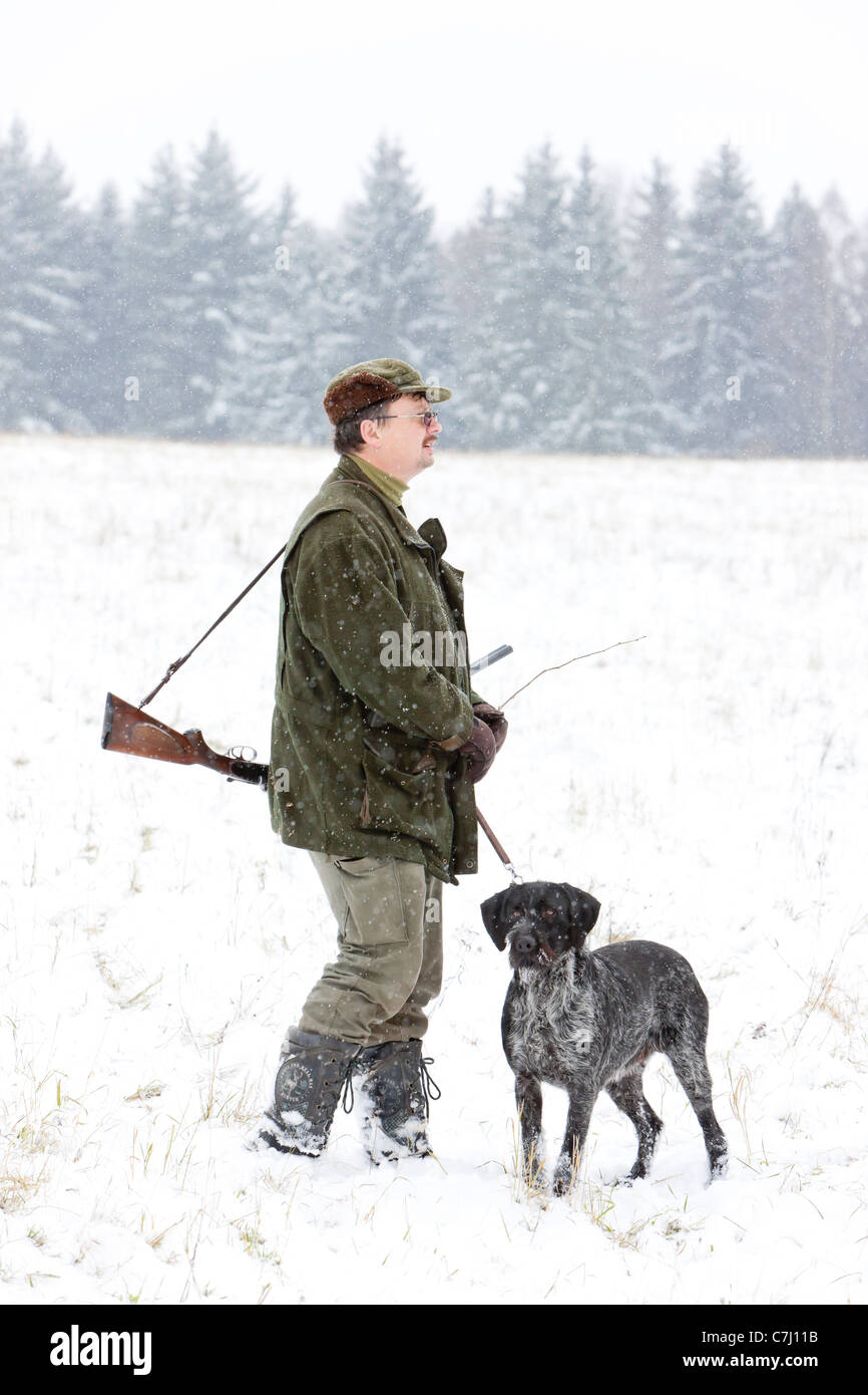 hunter with his dog hunting Stock Photo - Alamy