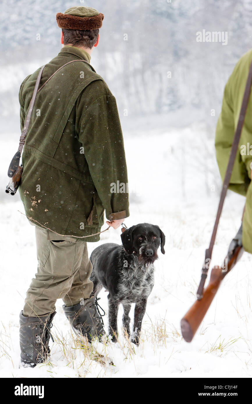 hunter with his dog hunting Stock Photo - Alamy