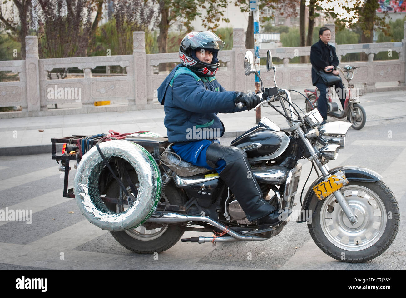 Big bike, little bike in Nanjing Stock Photo - Alamy