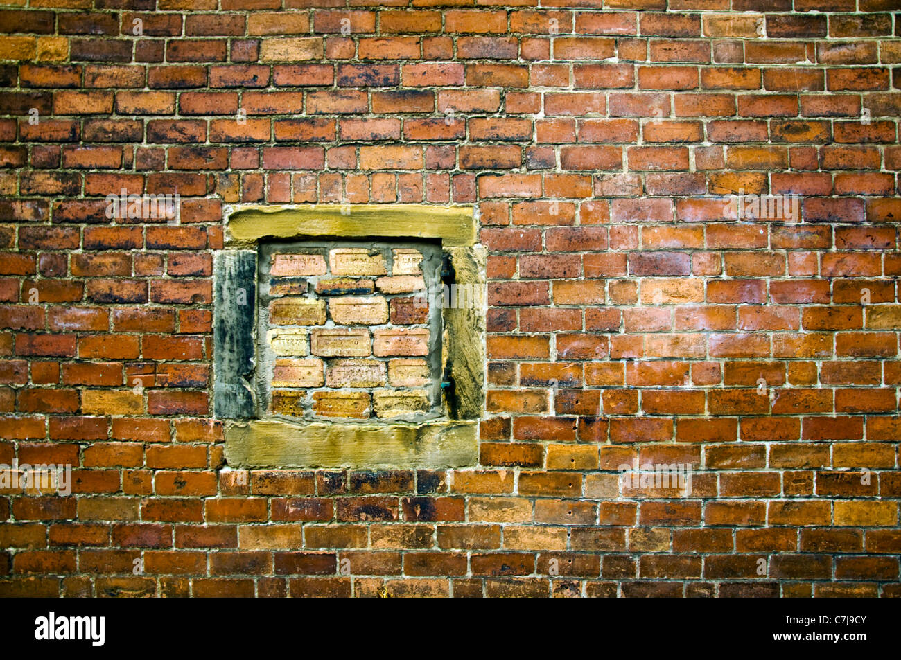 Bricked up window in a wall Stock Photo - Alamy