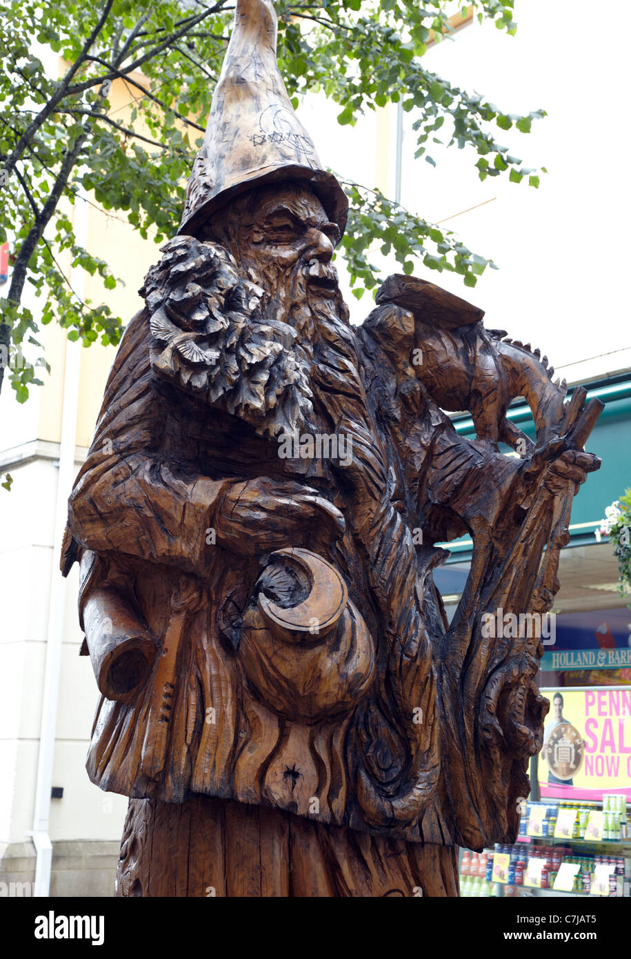 Wooden Carving Of Merlin Carmarthen Dyfed West Wales UK Stock Photo - Alamy