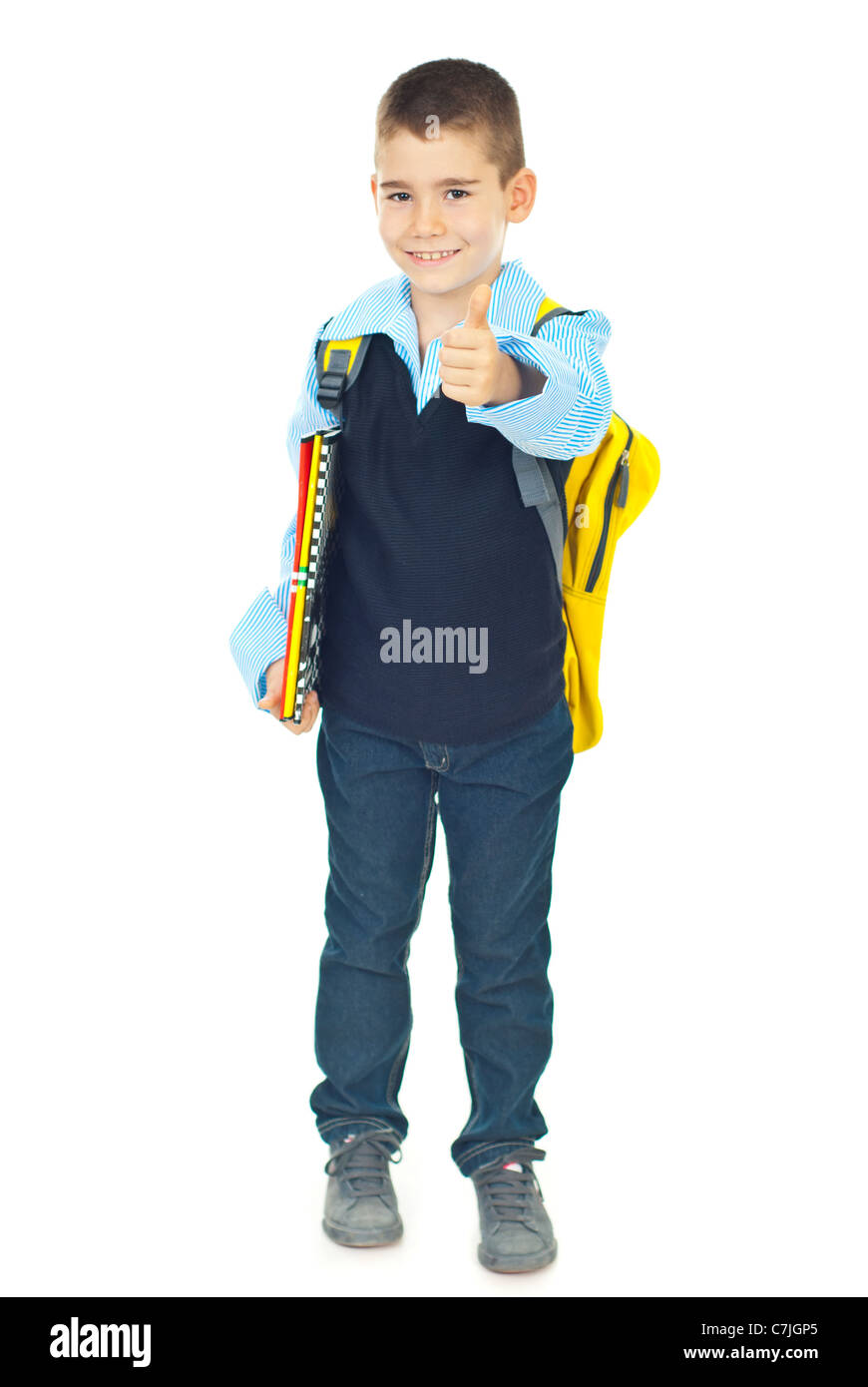 Successful schoolboy in first day of school giving thumb up isolated on ...