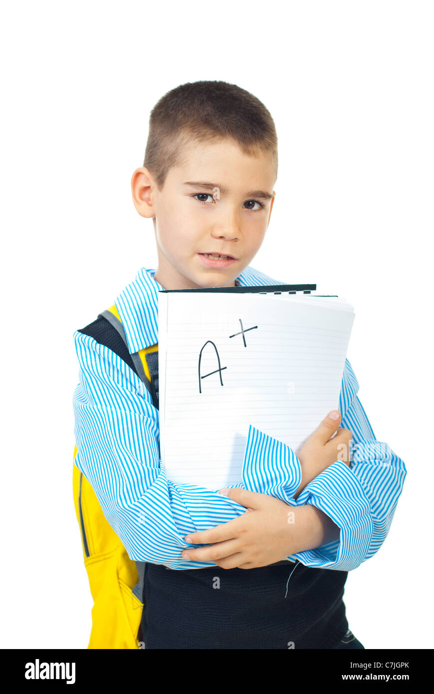 School boy holding good test result with A + isolated on white ...