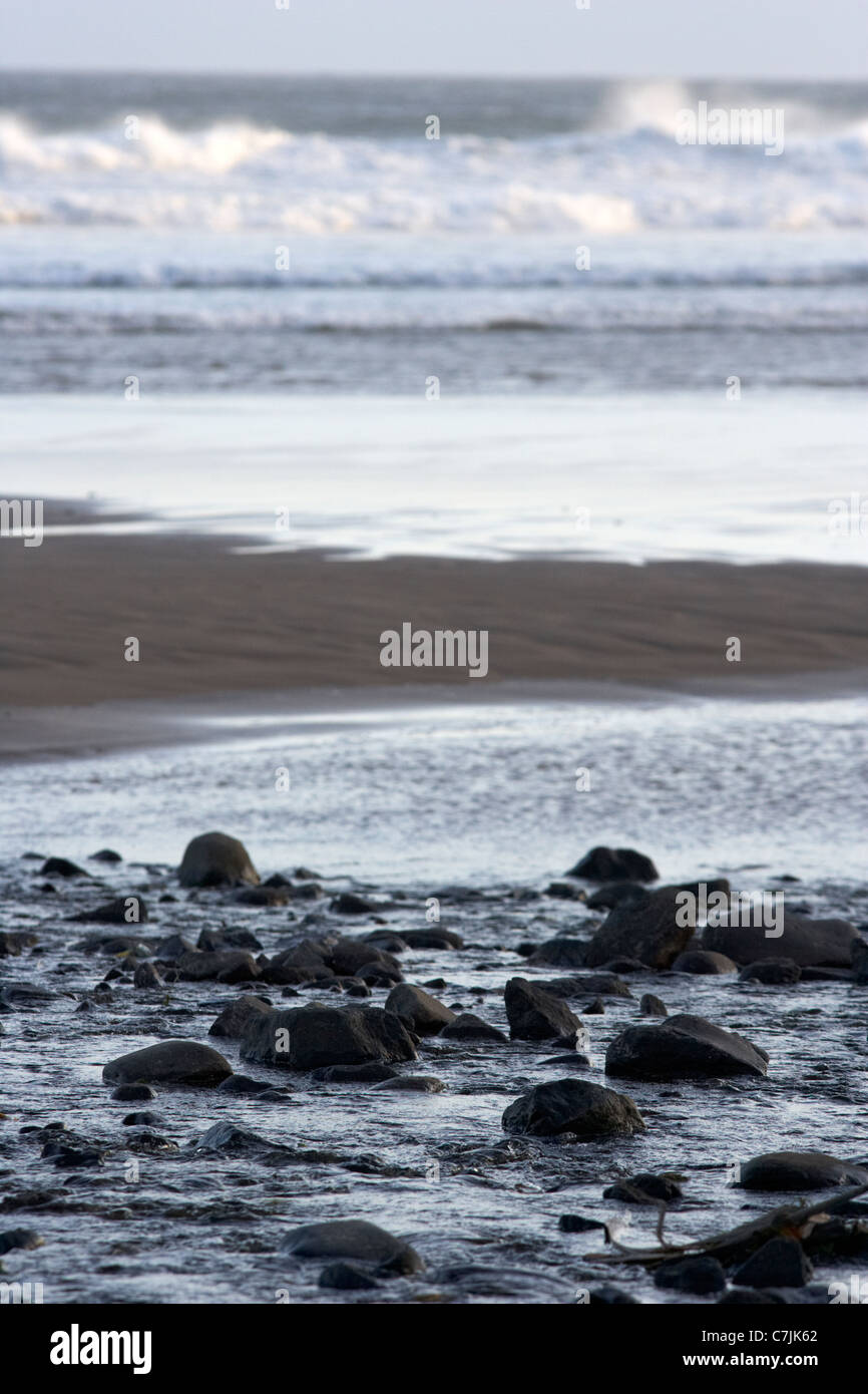 river flowing into the sea at benone strand beach county derry ...