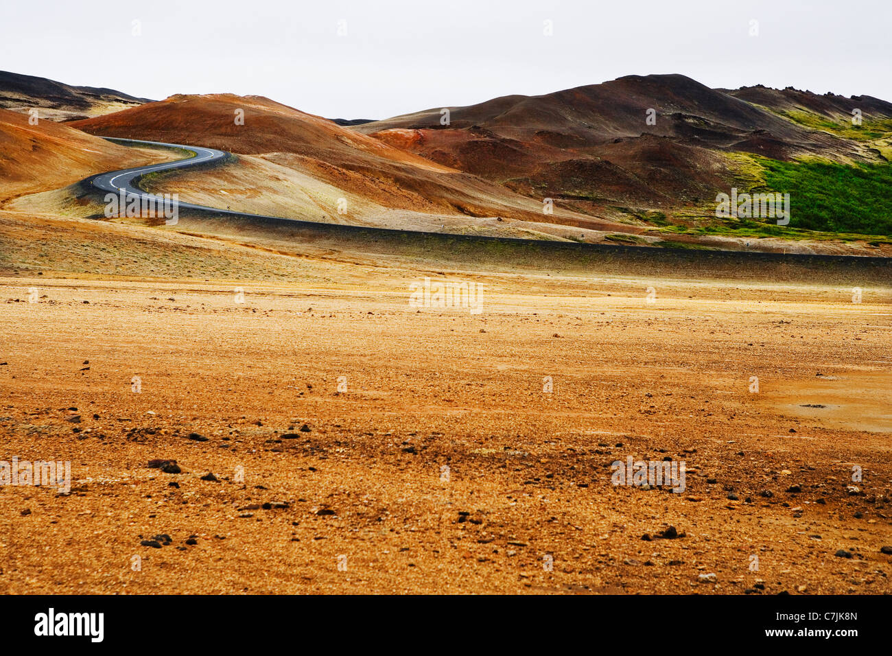 Paved road in dry rural landscape Stock Photo - Alamy