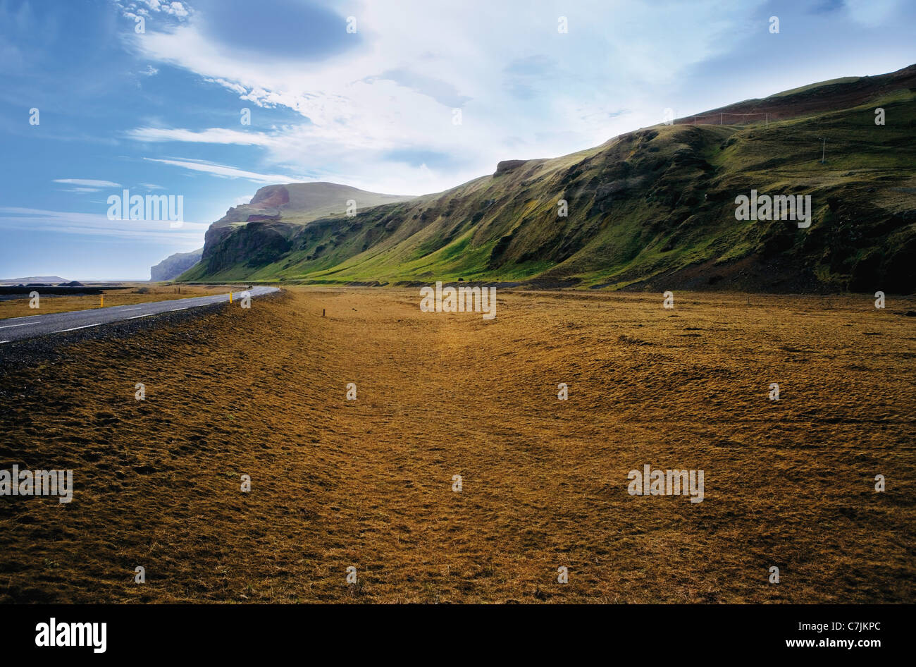 Paved road in dry rural landscape Stock Photo - Alamy