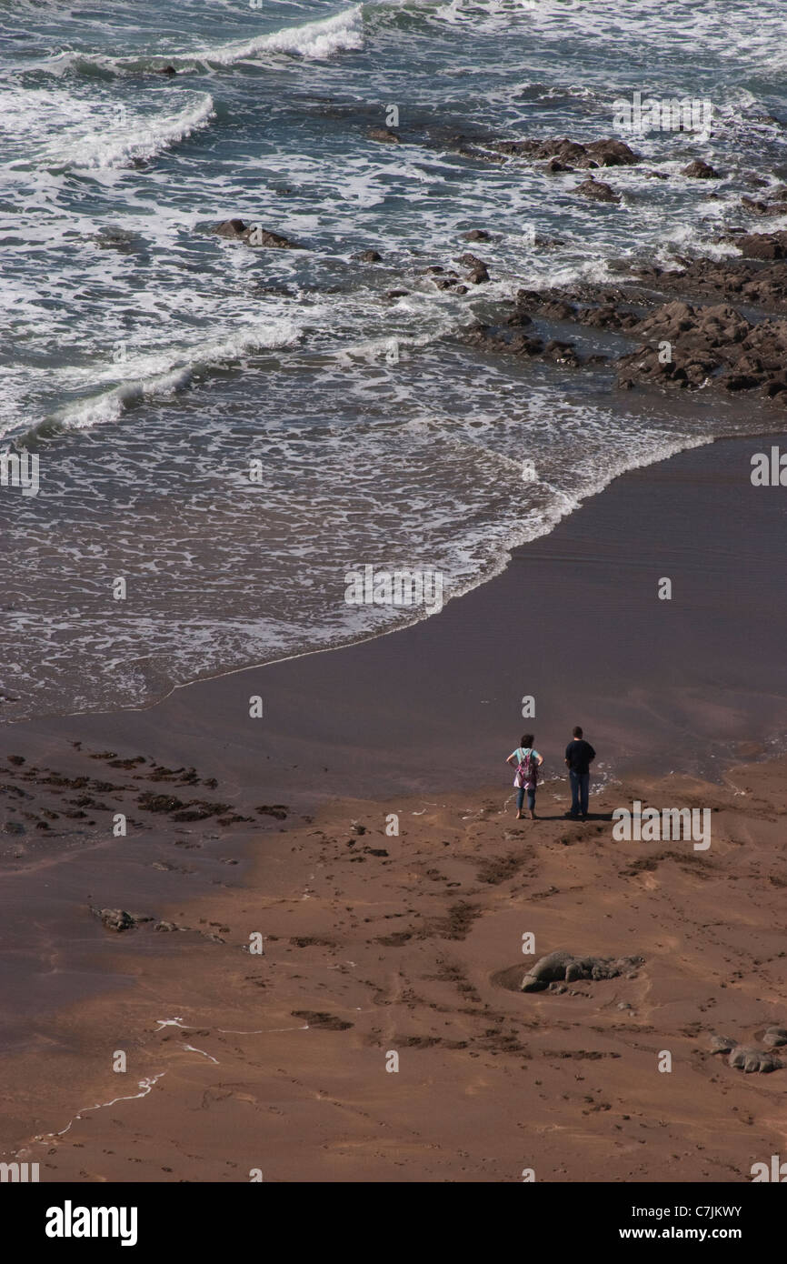 People on sandy beach Stock Photo - Alamy