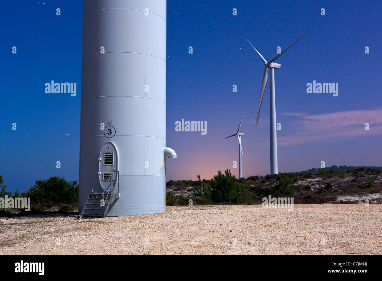 Wind generators at night Stock Photo - Alamy