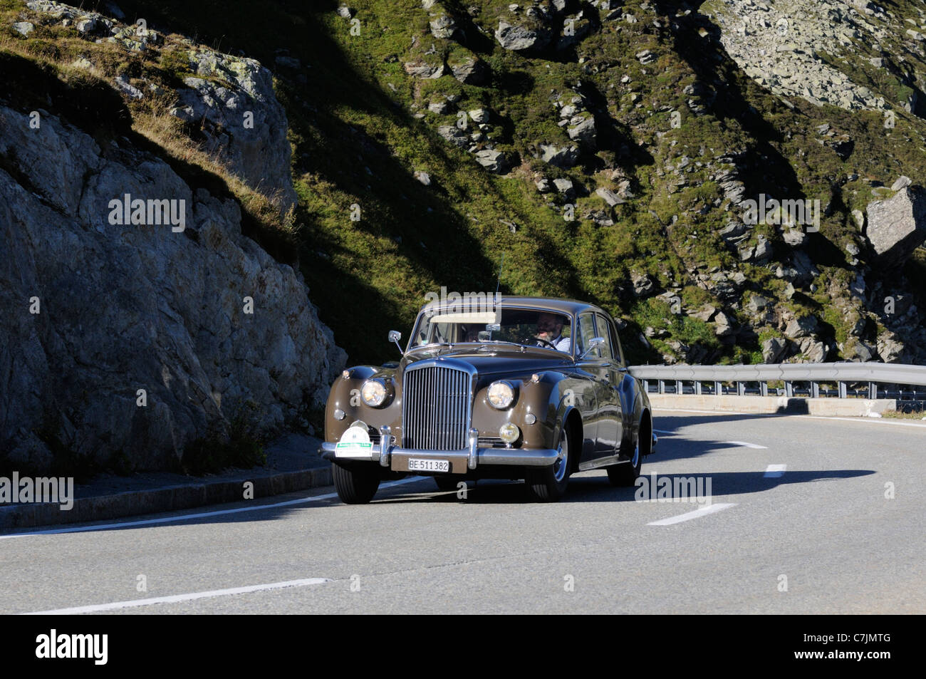 Switzerland, Western Europe, Grimselpass. Oldtimer car on the southern ...