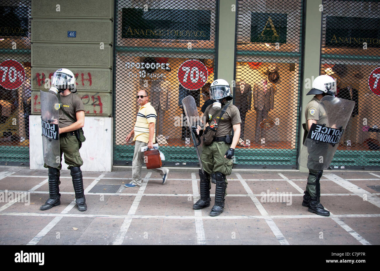 Riot police during student march in demonstration against austerity ...