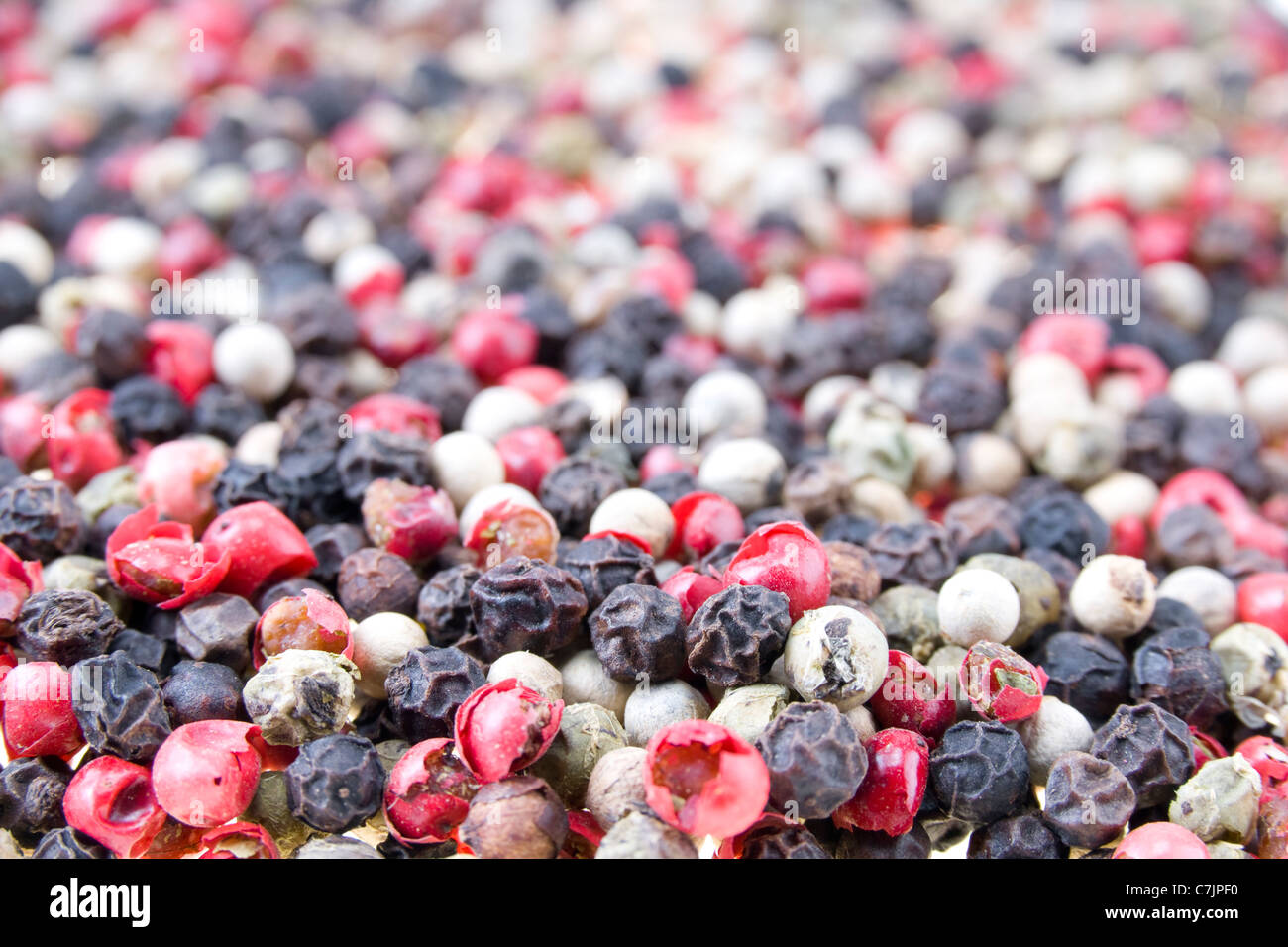 Color peppercorns close up Stock Photo - Alamy