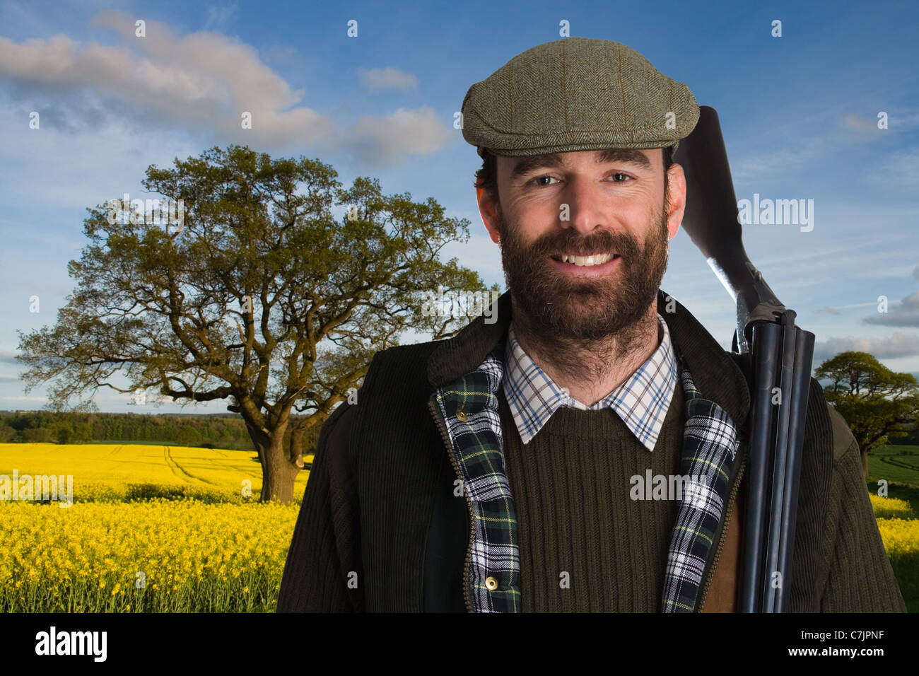 Man in tweed carrying shotgun hi-res stock photography and images - Alamy