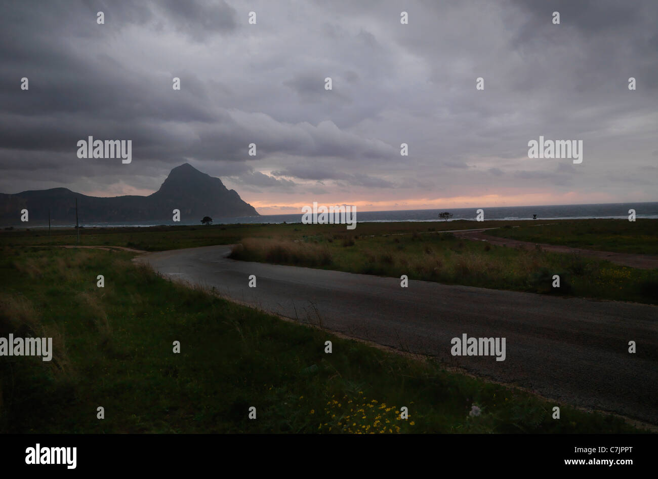 Paved road in rural landscape Stock Photo - Alamy