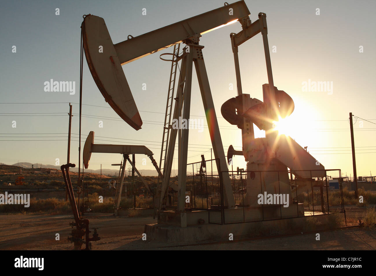 Pump at oil field Stock Photo - Alamy