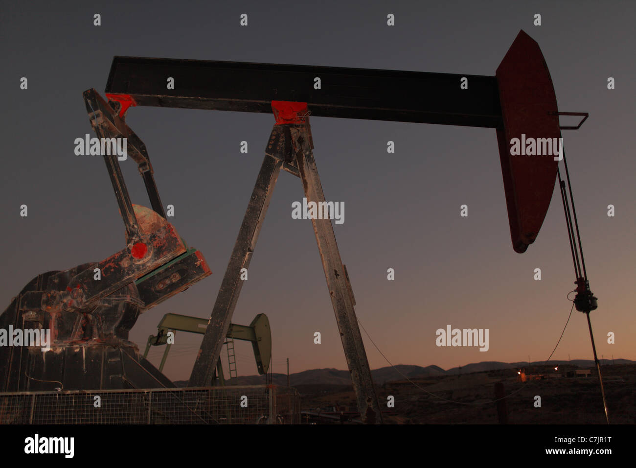Pump at oil field Stock Photo - Alamy