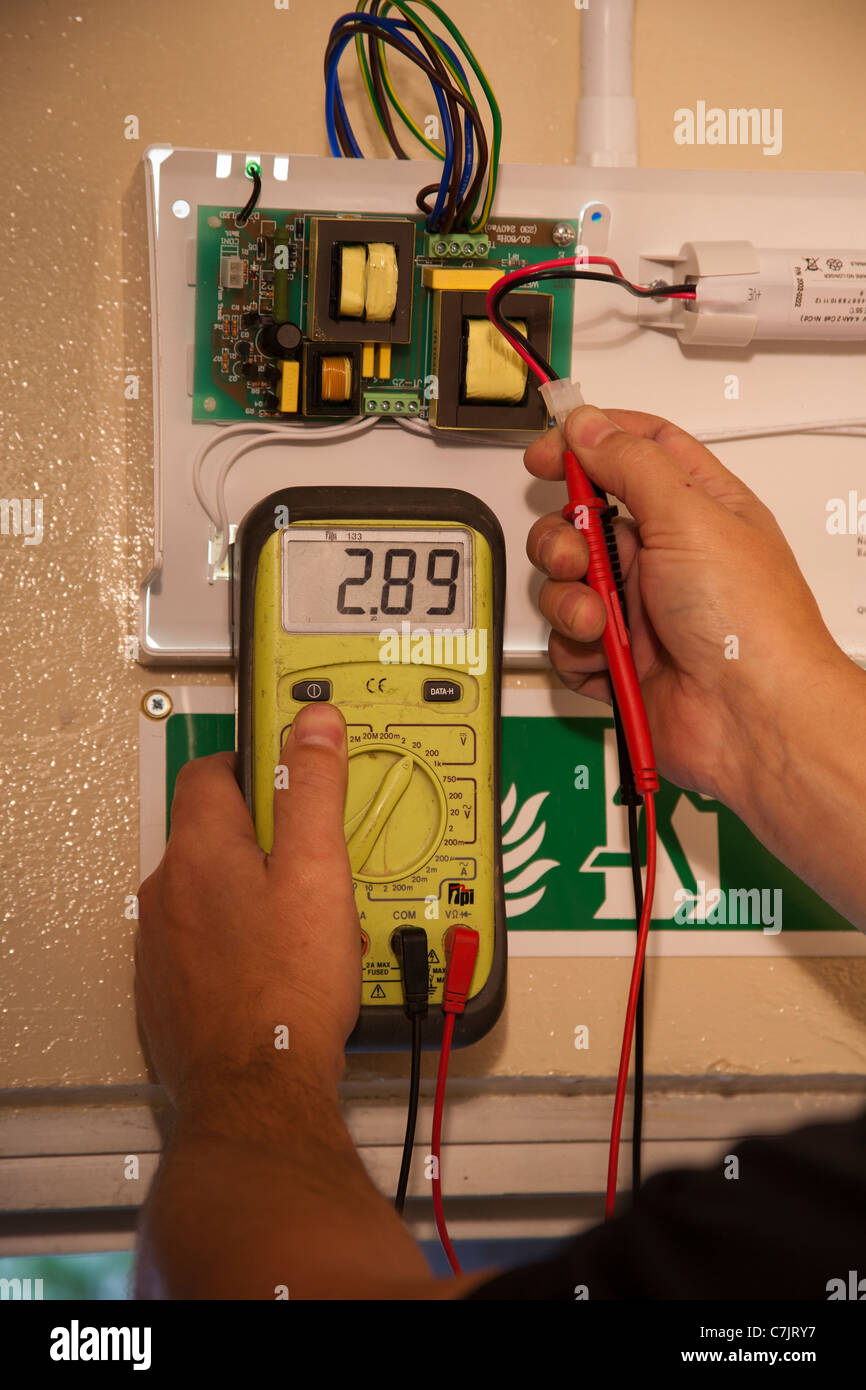 Fault finding an emergency light Stock Photo - Alamy