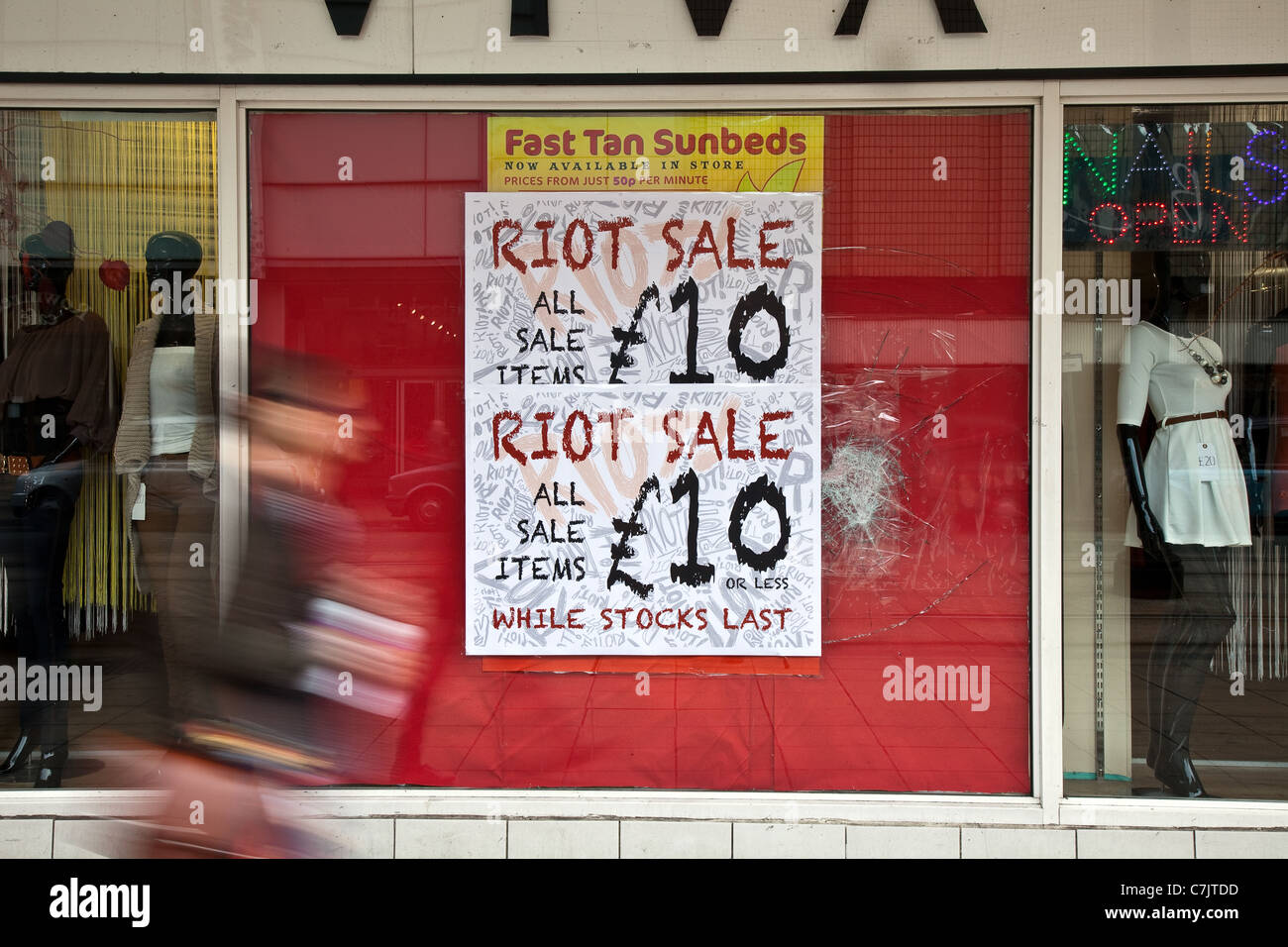 Riot Sale Shattered Glass Window in Manchester, UK Stock Photo - Alamy