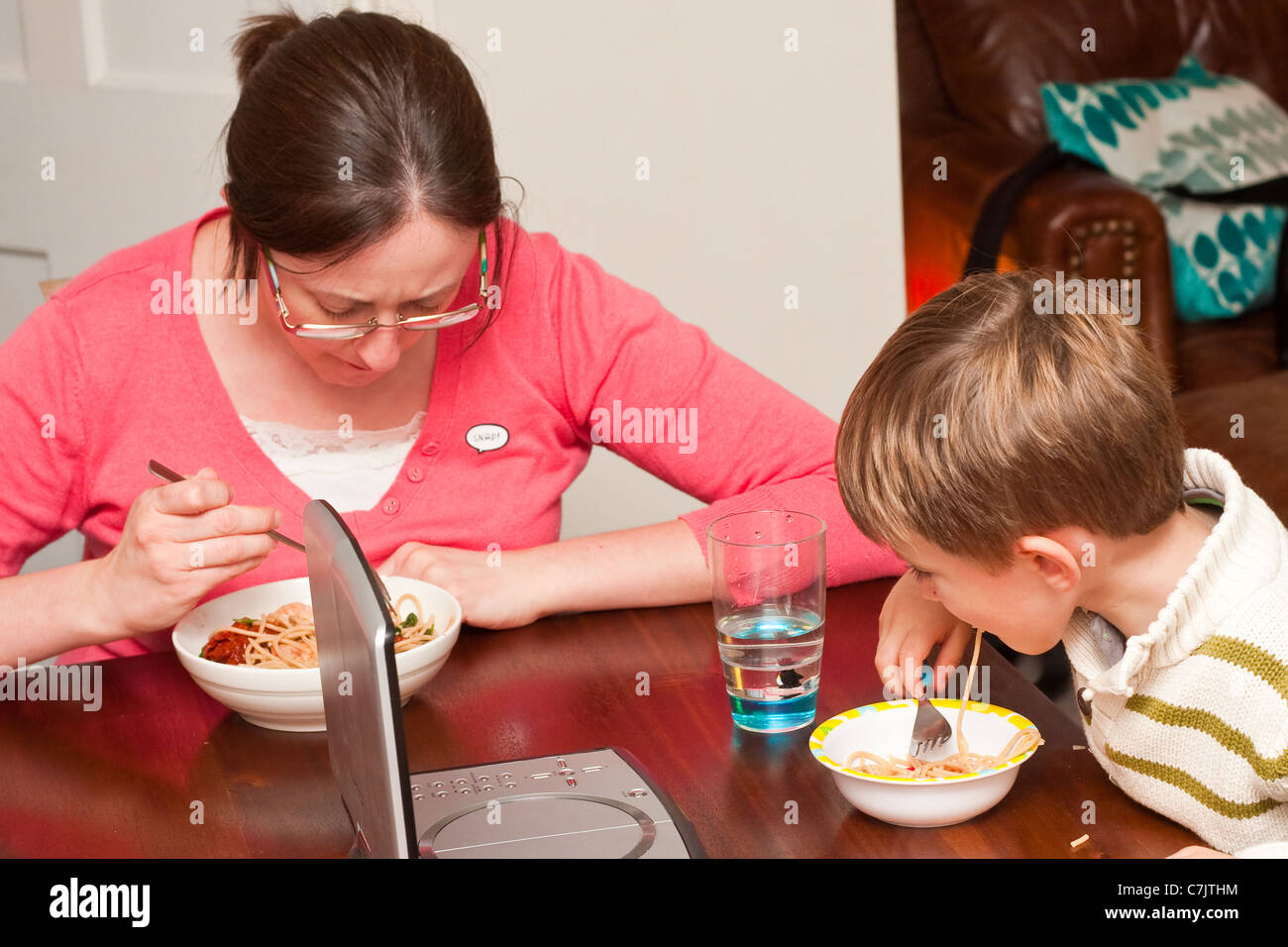 Family eating spaghetti bolognese hi-res stock photography and images ...