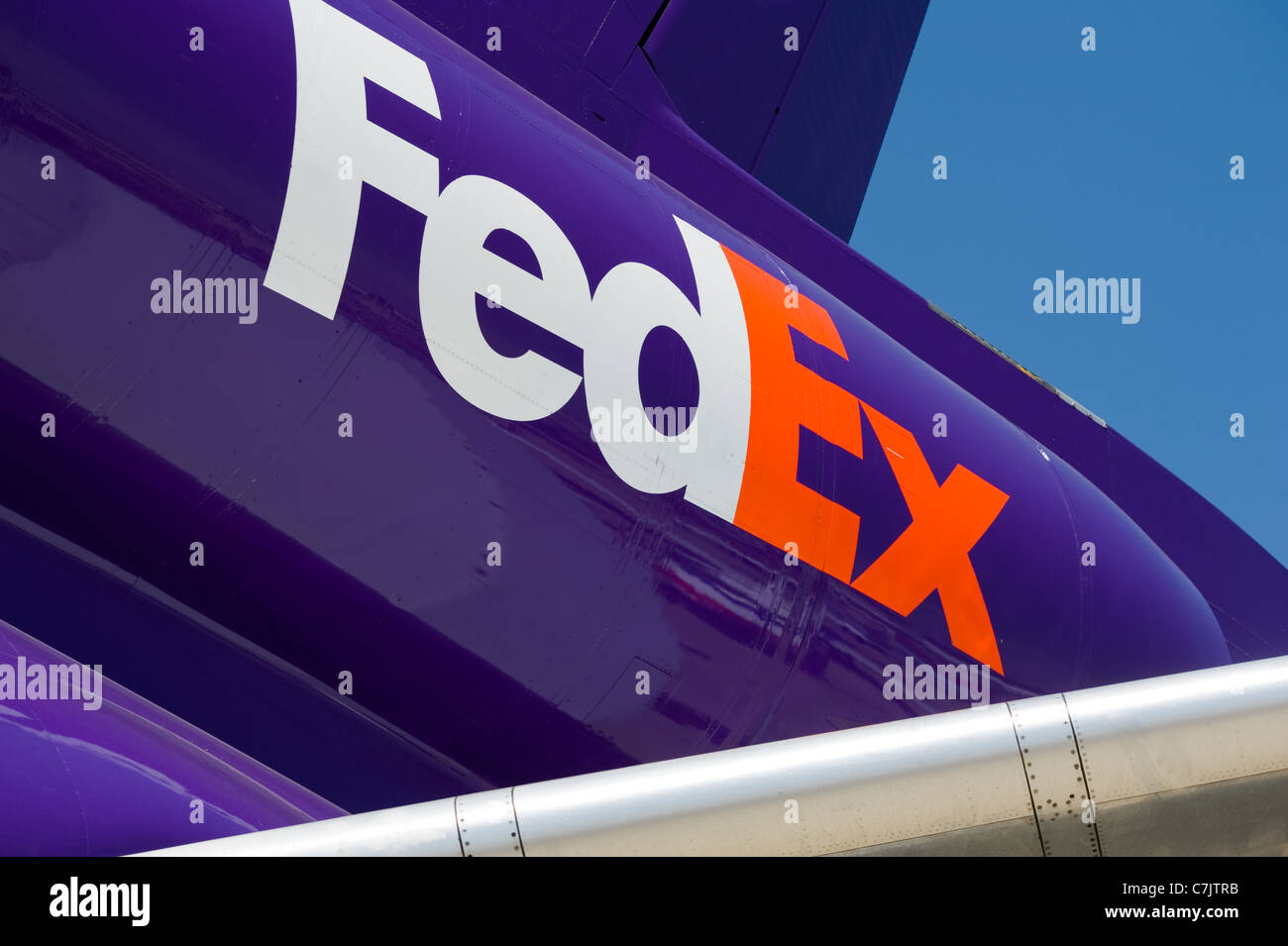 FedEx sign logo on fuselage of commercial aircraft Stock Photo - Alamy