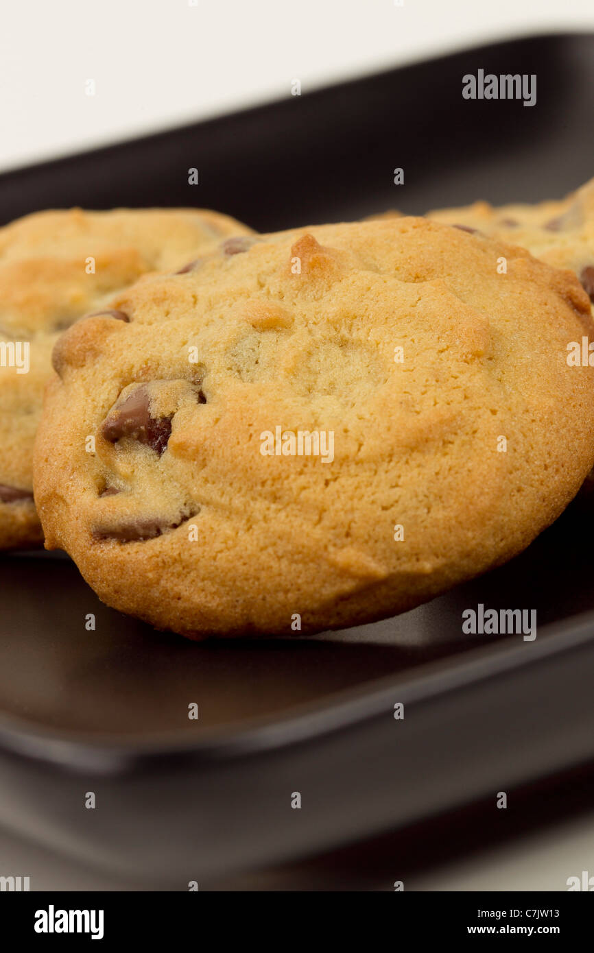 Fresh baked homemade Chocolate Chip Cookies photographed in a studio on ...