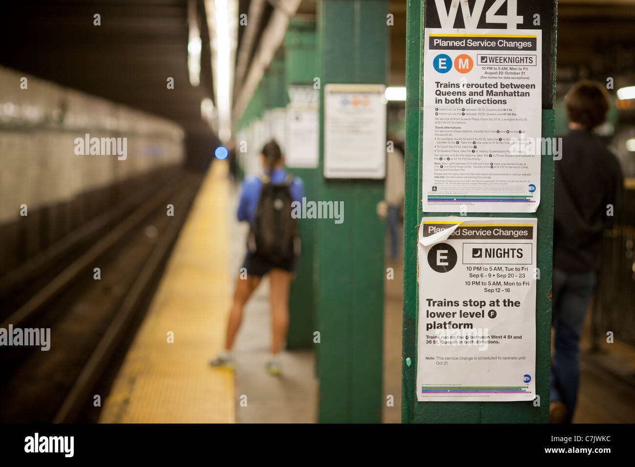 Signs posted at West 4th Street subway station in New York inform the ...
