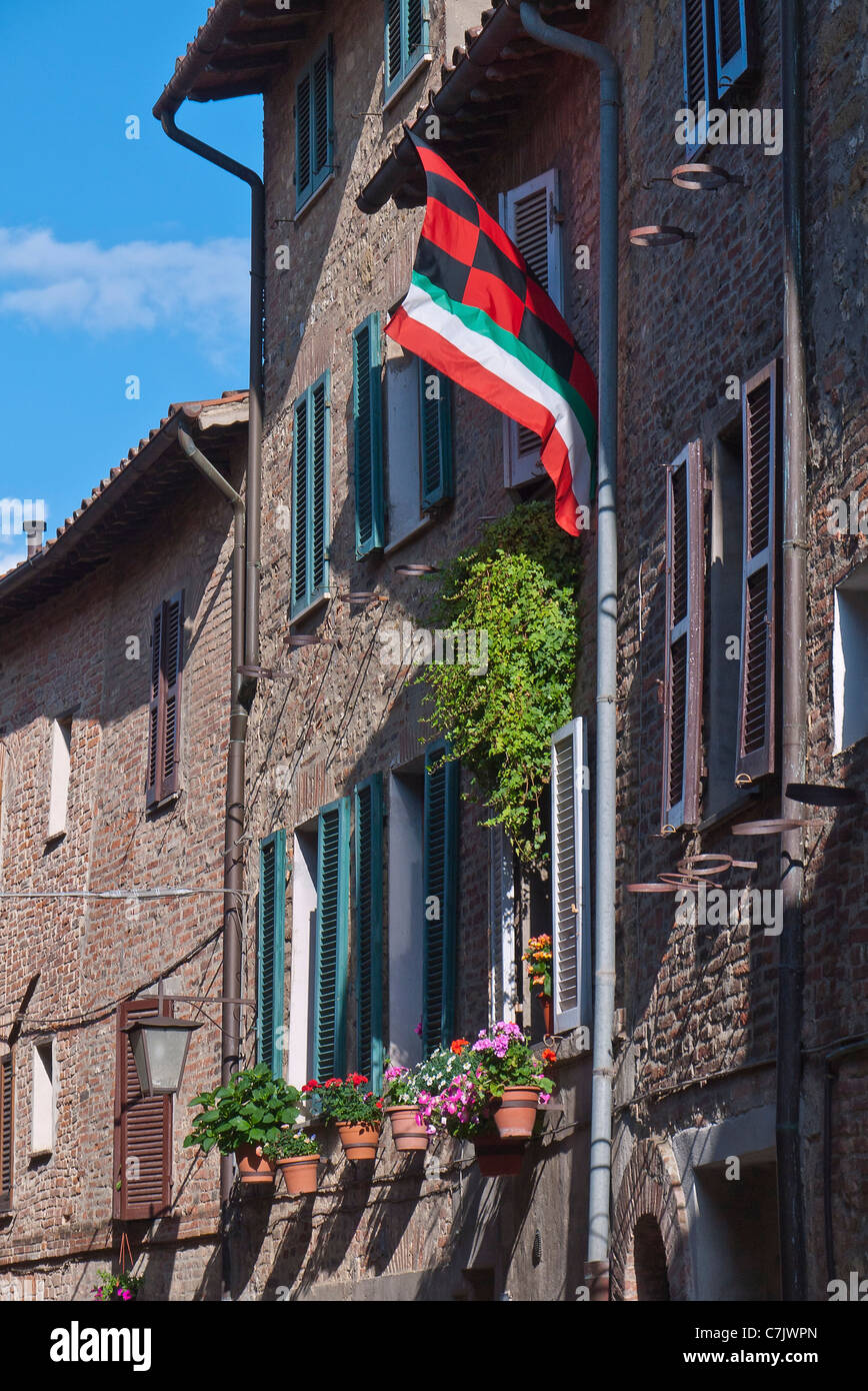 Exterior image of building with Italian racing flag and flower box in ...