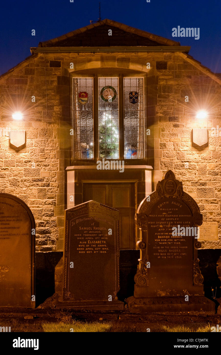 Evening church hall exterior (lighting, stained glass windows ...
