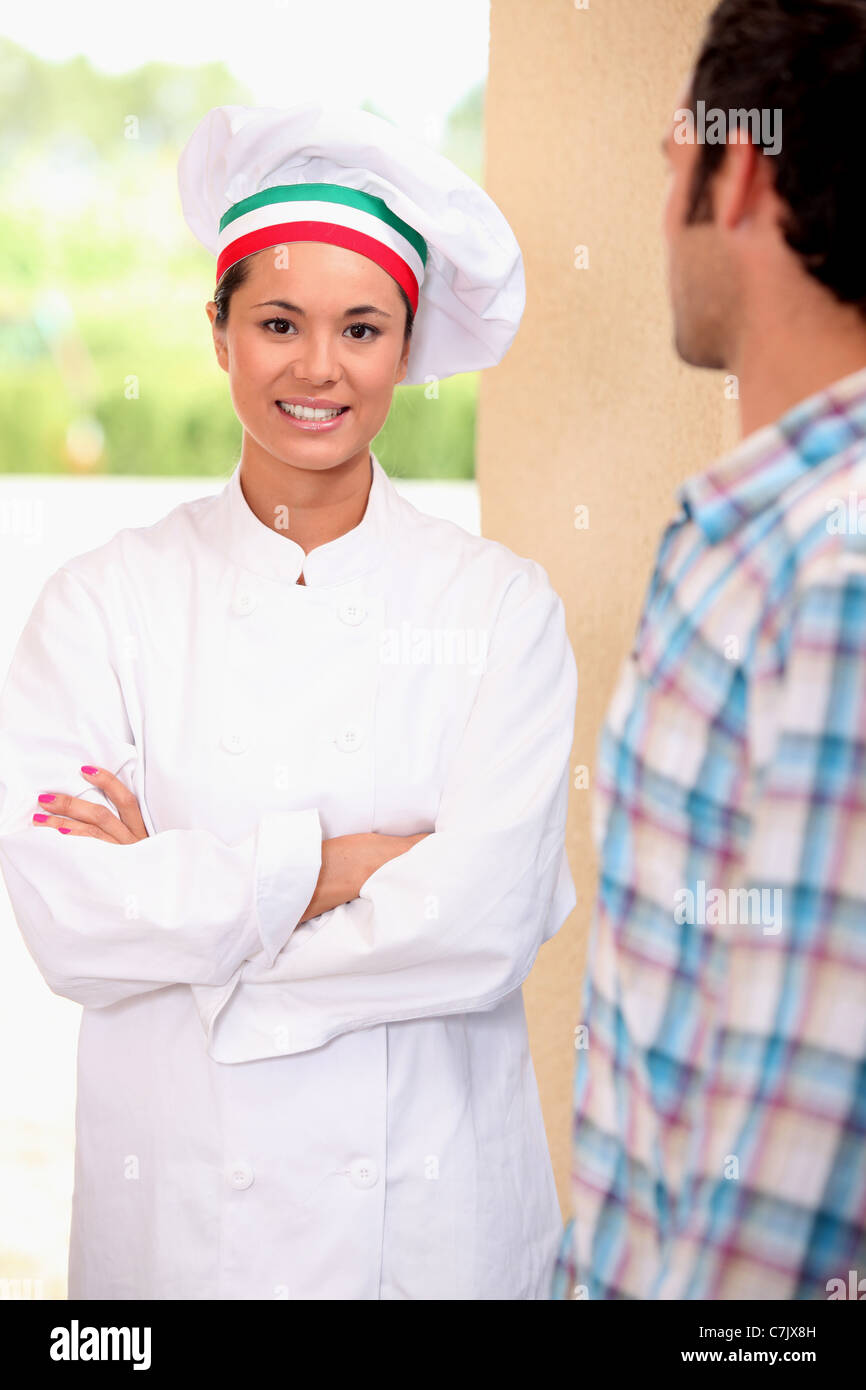 Chef on doorstep Stock Photo - Alamy