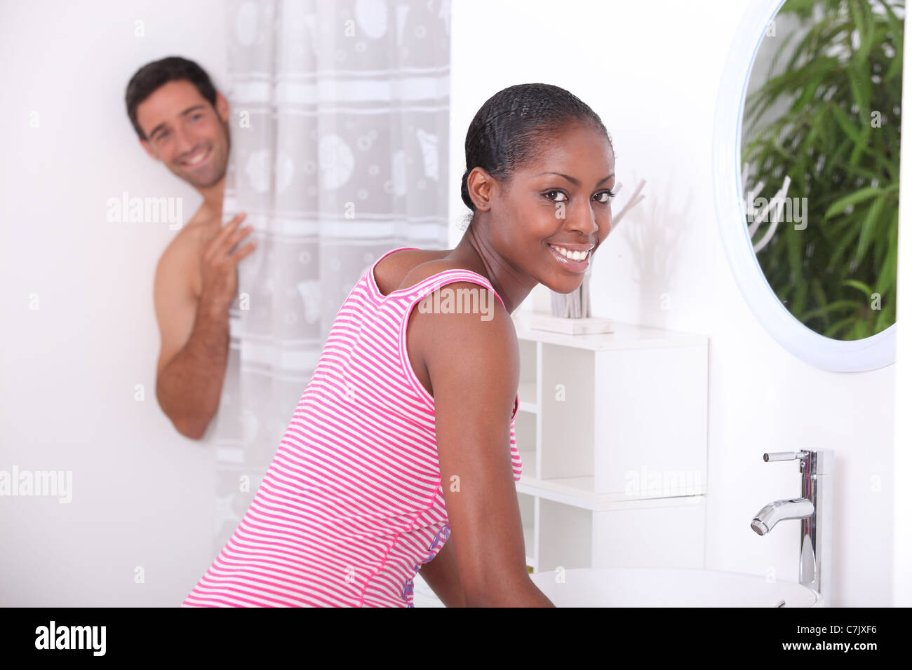 Couple washing hair in bathroom hi-res stock photography and images - Alamy