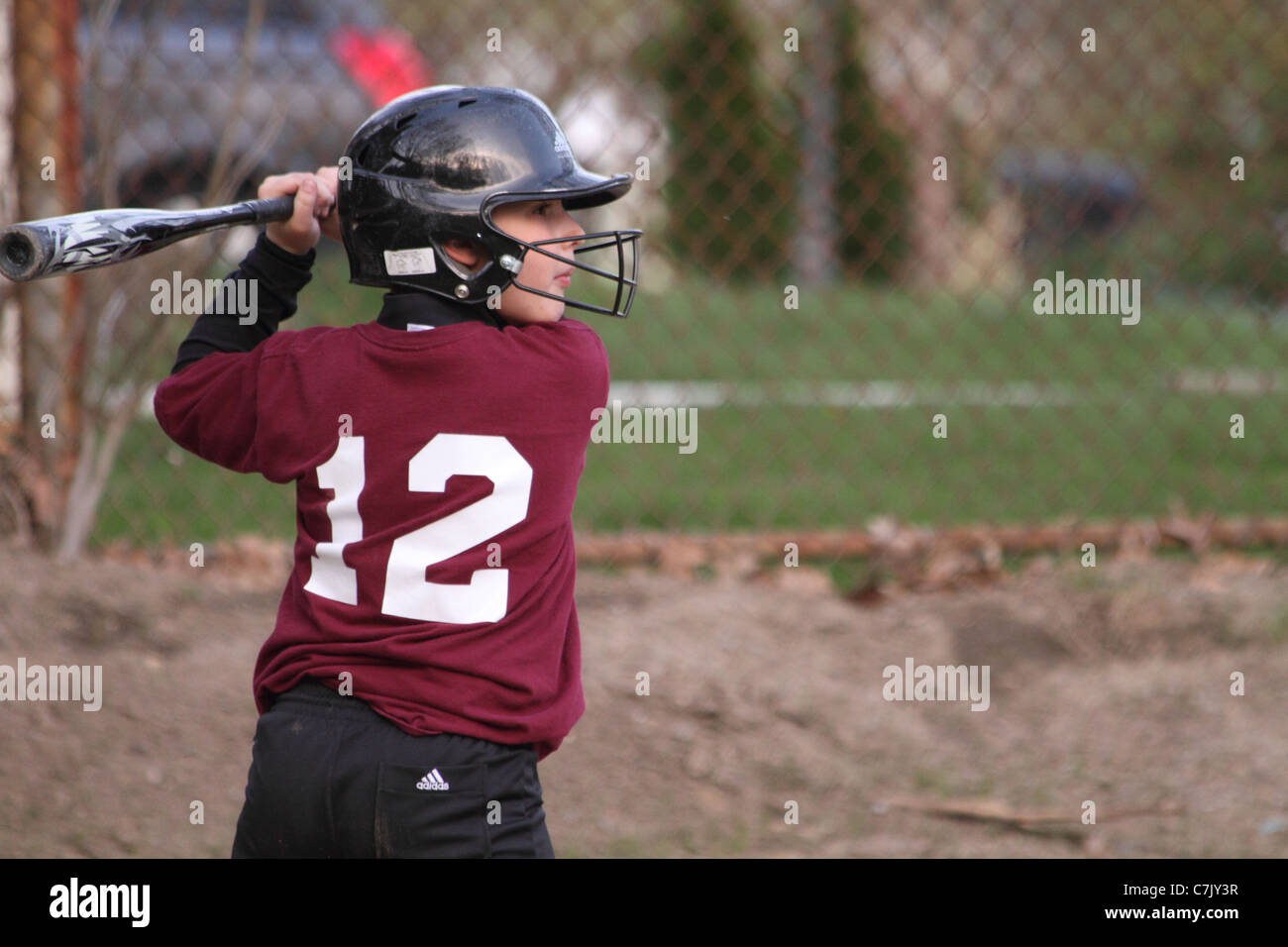 baseball player ready for the pitch to hit out of the park farm league ...