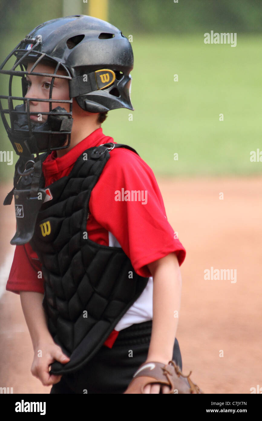 catcher walking back to the plate for position Stock Photo - Alamy