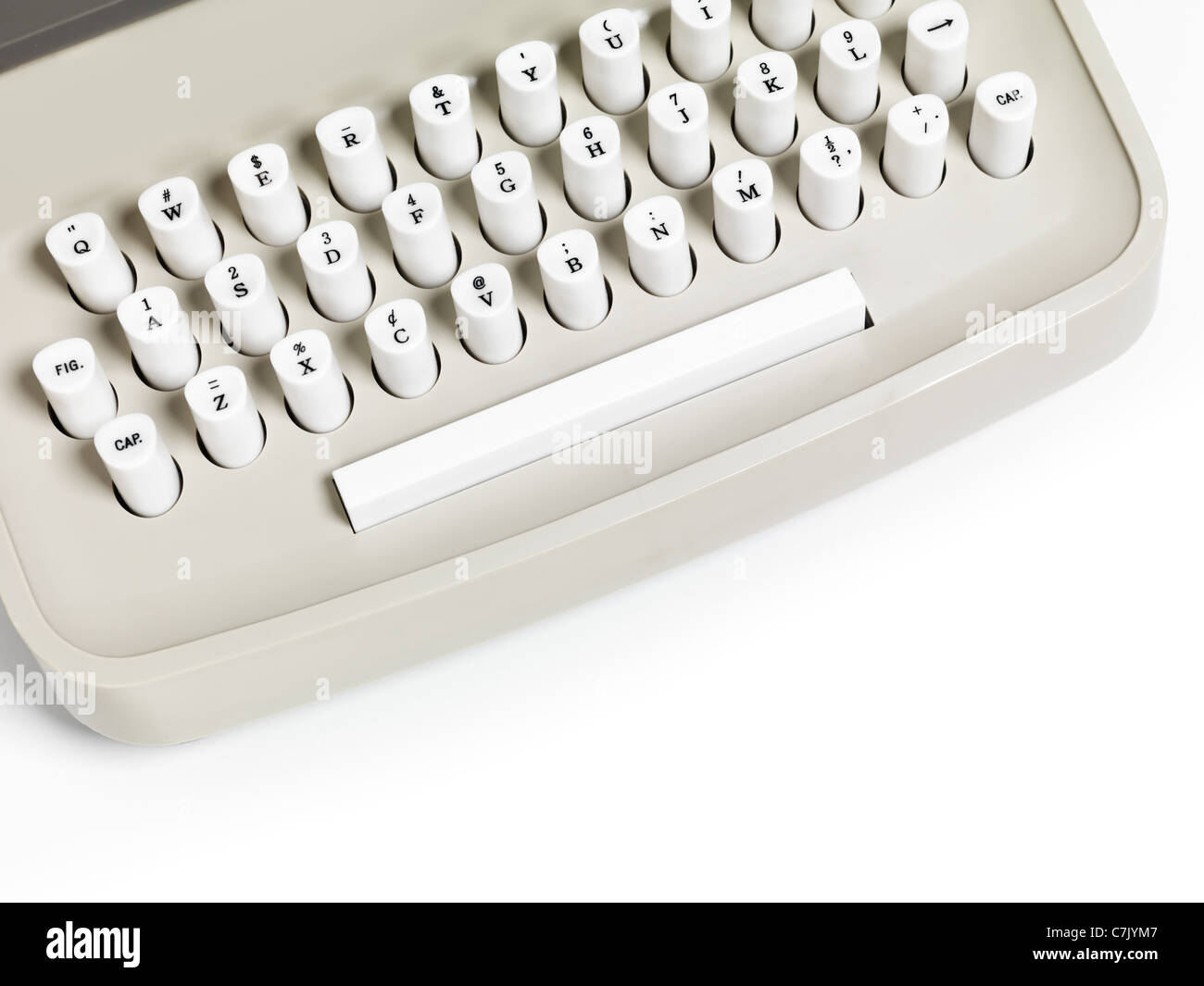 Closeup of a retro typewriter keyboard isolated on white background ...