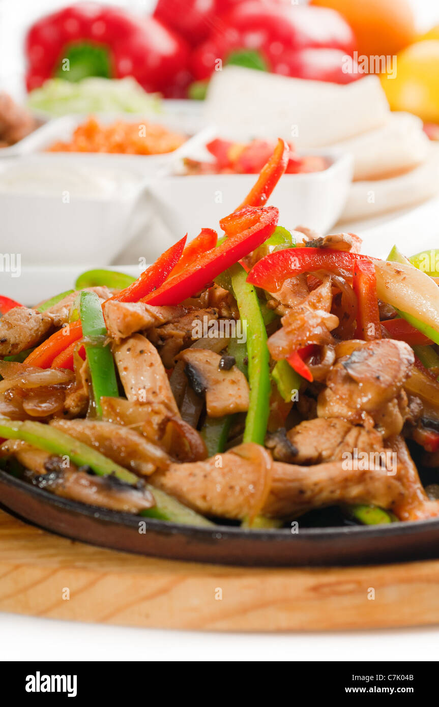 original fajita sizzling smoking hot served on iron plate and fresh ...