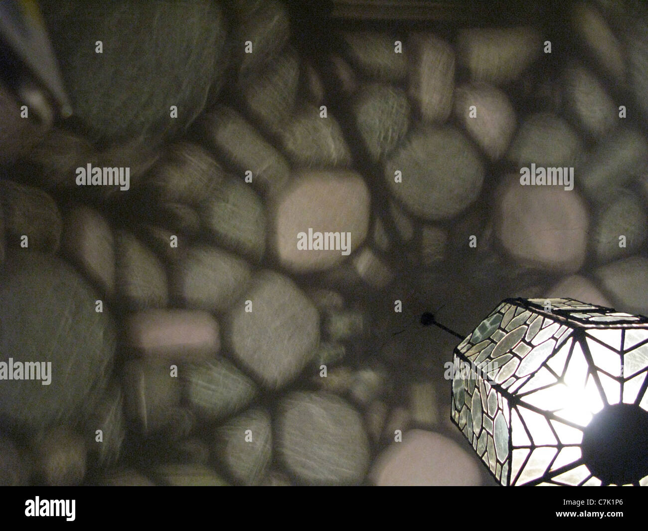 Tiffany style lamp casting pattern onto ceiling Stock Photo - Alamy
