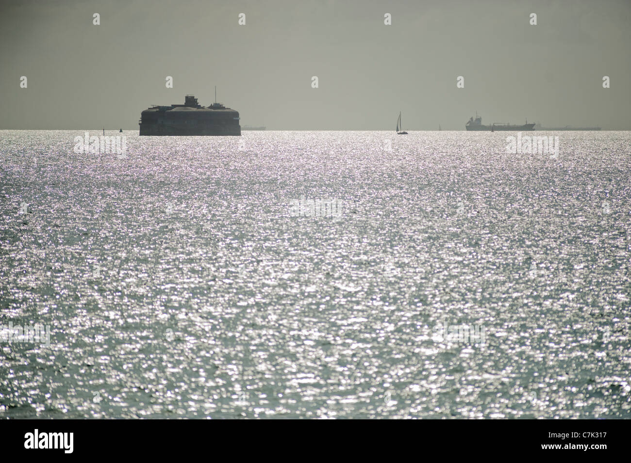 Horse Sand Victorian Sea Fort in the Solent with passing shipping in ...