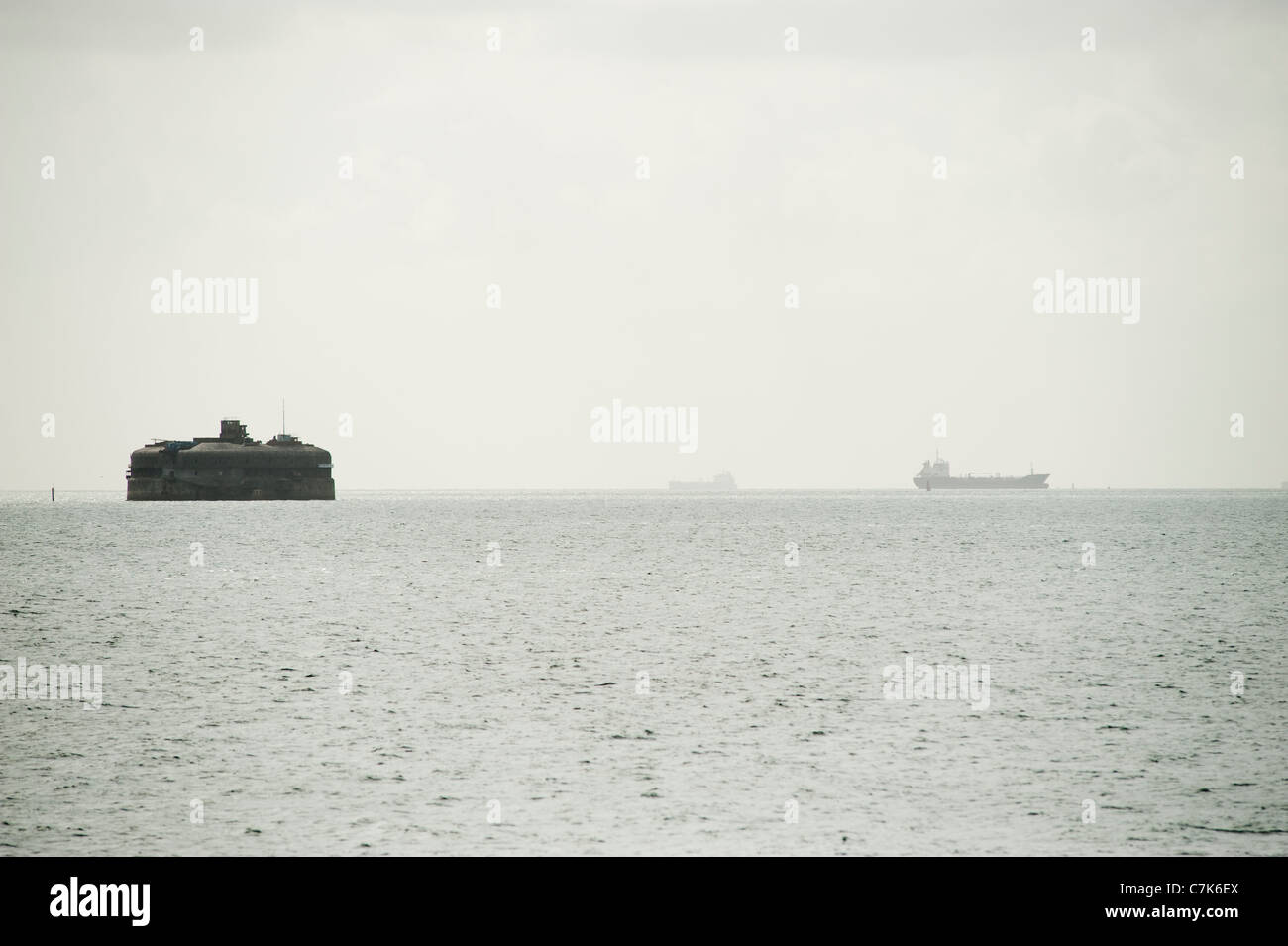 Horse Sand Victorian Sea Fort in the Solent with passing shipping in ...